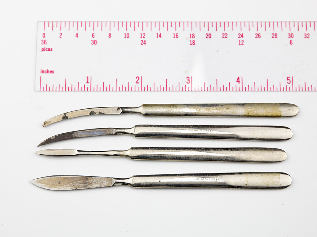Four Metal Handle Scalpels