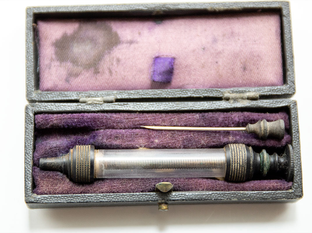 Early Syringe with Needle